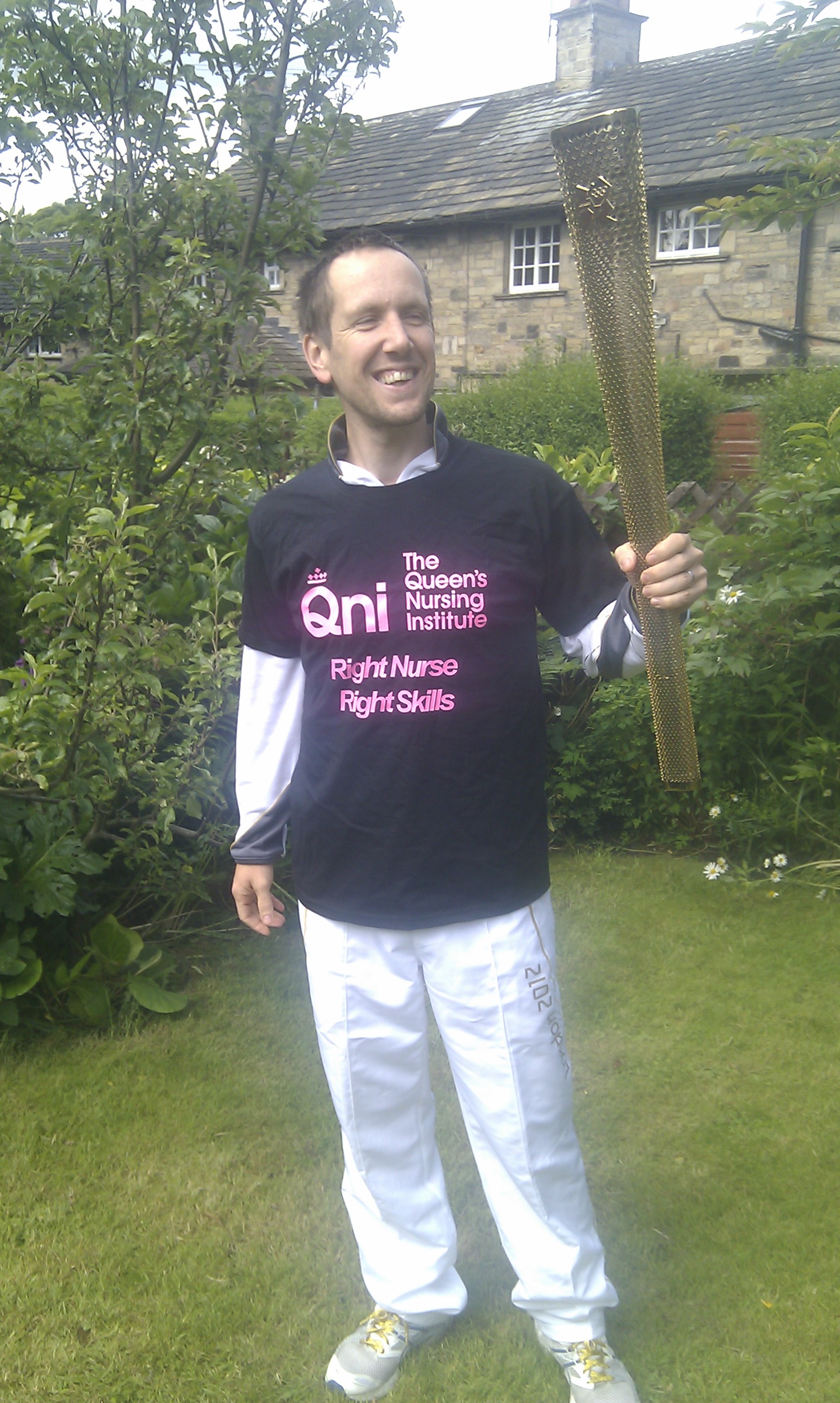 Queen’s nurse carries Olympic torch | Nursing Times